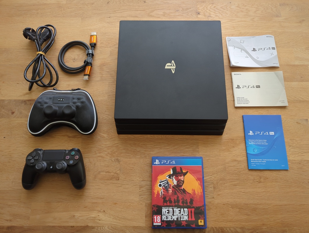 PS4 Pro Zwart + controller, game RDR2 en accessoires aangeboden - Vraag ...