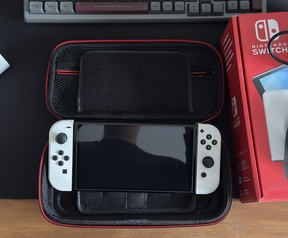 Nintendo Switch (OLED model) Wit met 512GB SD-kaart aangeboden - Vraag ...